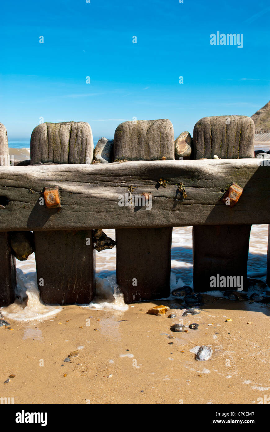 Coastal timber groynes on Cromer beach, Norfolk, England, UK Stock ...