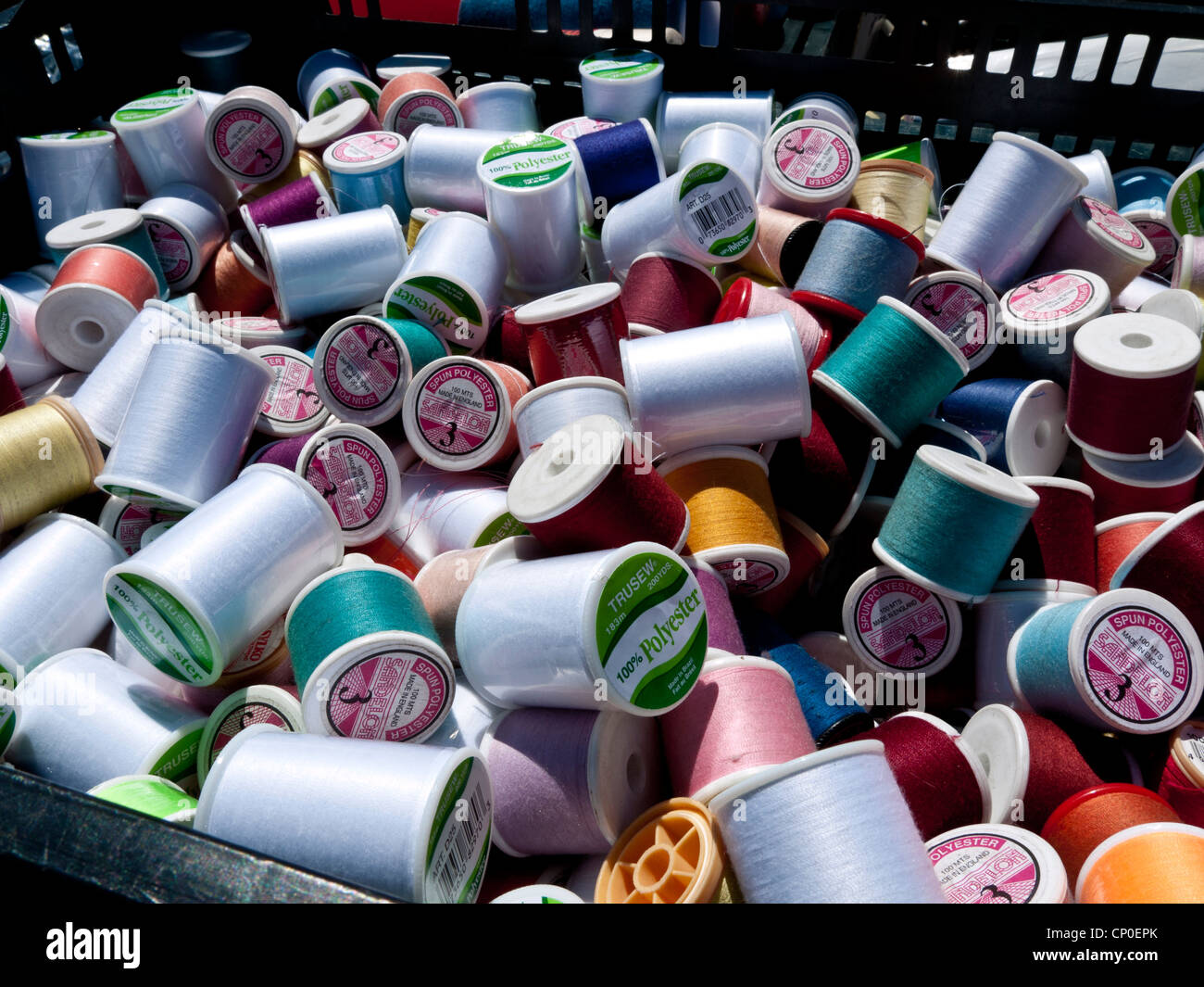 Cotton reels and coloured threads Stock Photo - Alamy