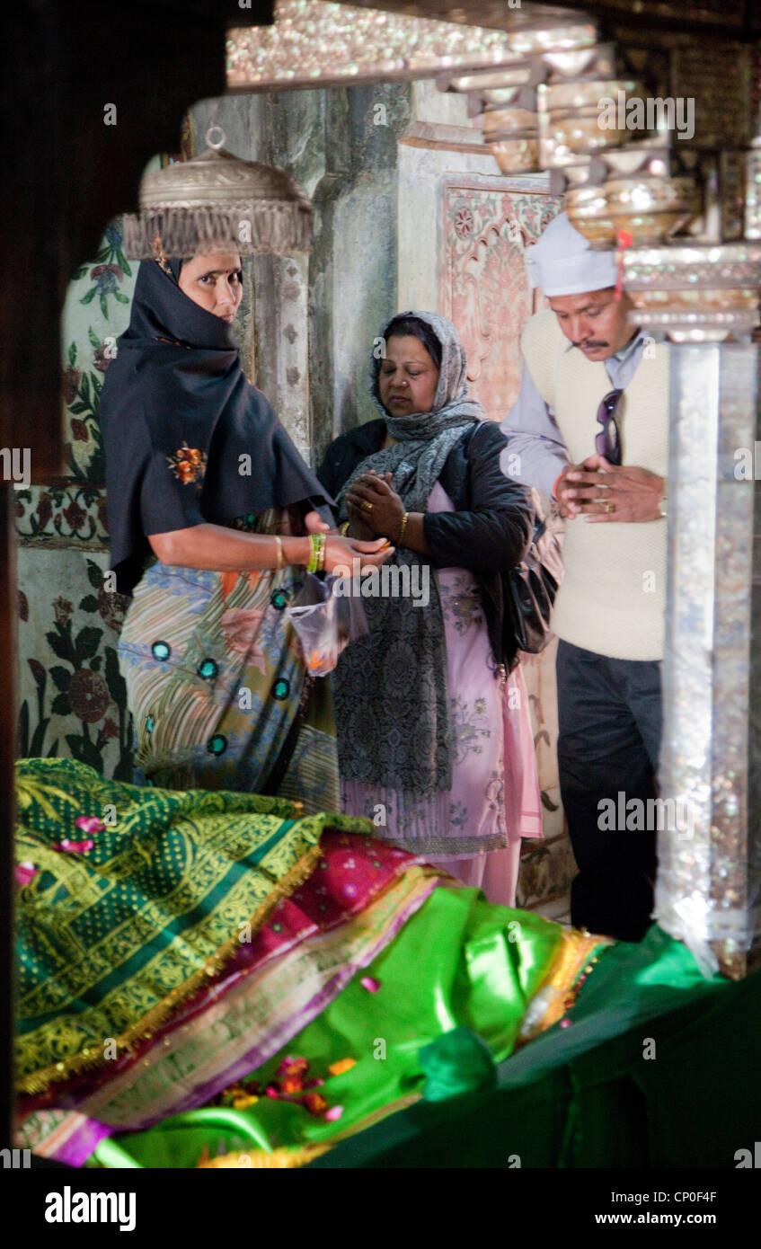 Fatehpur Sikri, India. Mausoleum of Sheikh Salim Chishti. Prayers are ...