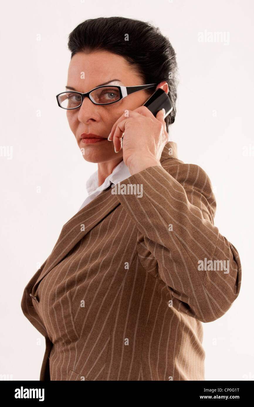 Business woman with glasses when phoning Stock Photo - Alamy