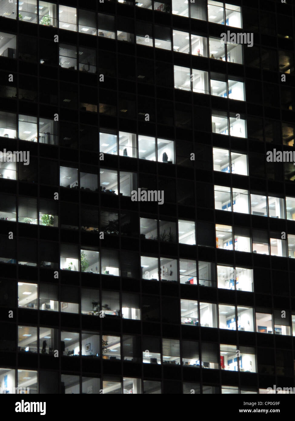 high rise office block in city at night Stock Photo - Alamy
