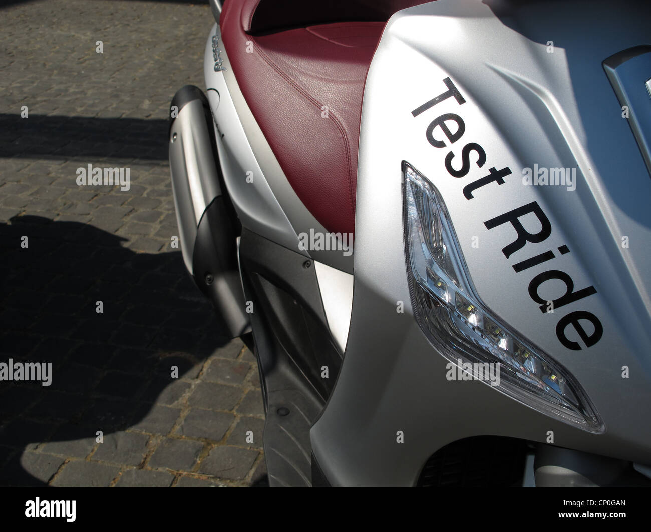 Test ride motorbike in showroom in rome italy Stock Photo - Alamy