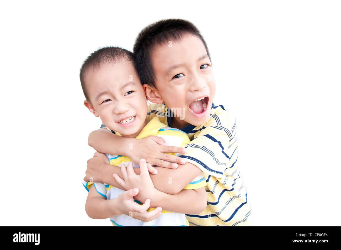 Two brothers hug Cut Out Stock Images & Pictures - Alamy