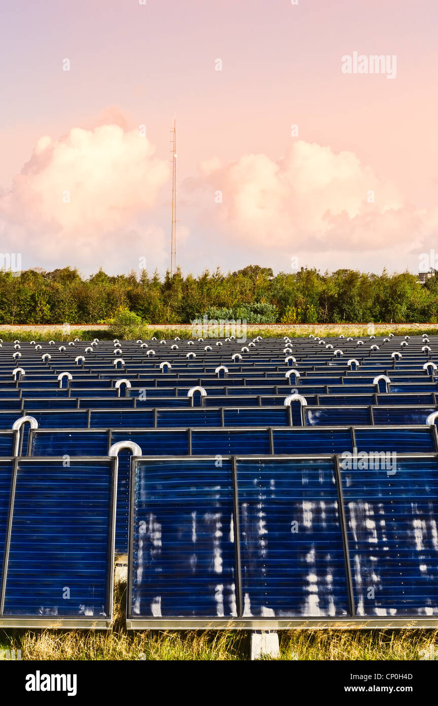 Solar heating plant producing hot water for power and house heating ...