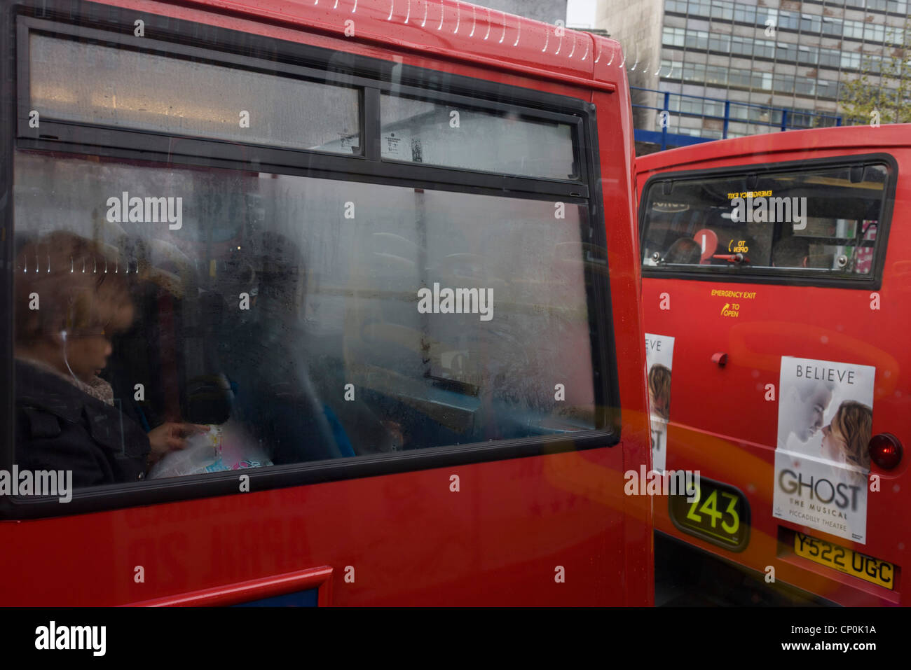 London bus passenger showing the everyday tedium of commuting in the UK ...