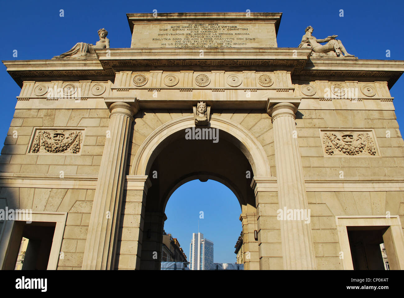 Ancient city entrance Porta Garibaldi gate on blue sky, Milan, Lombardy ...