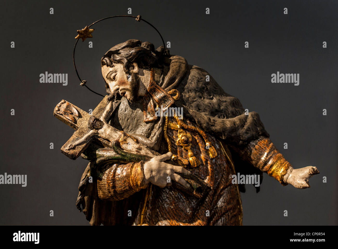 Saint holding a cross hi-res stock photography and images - Alamy