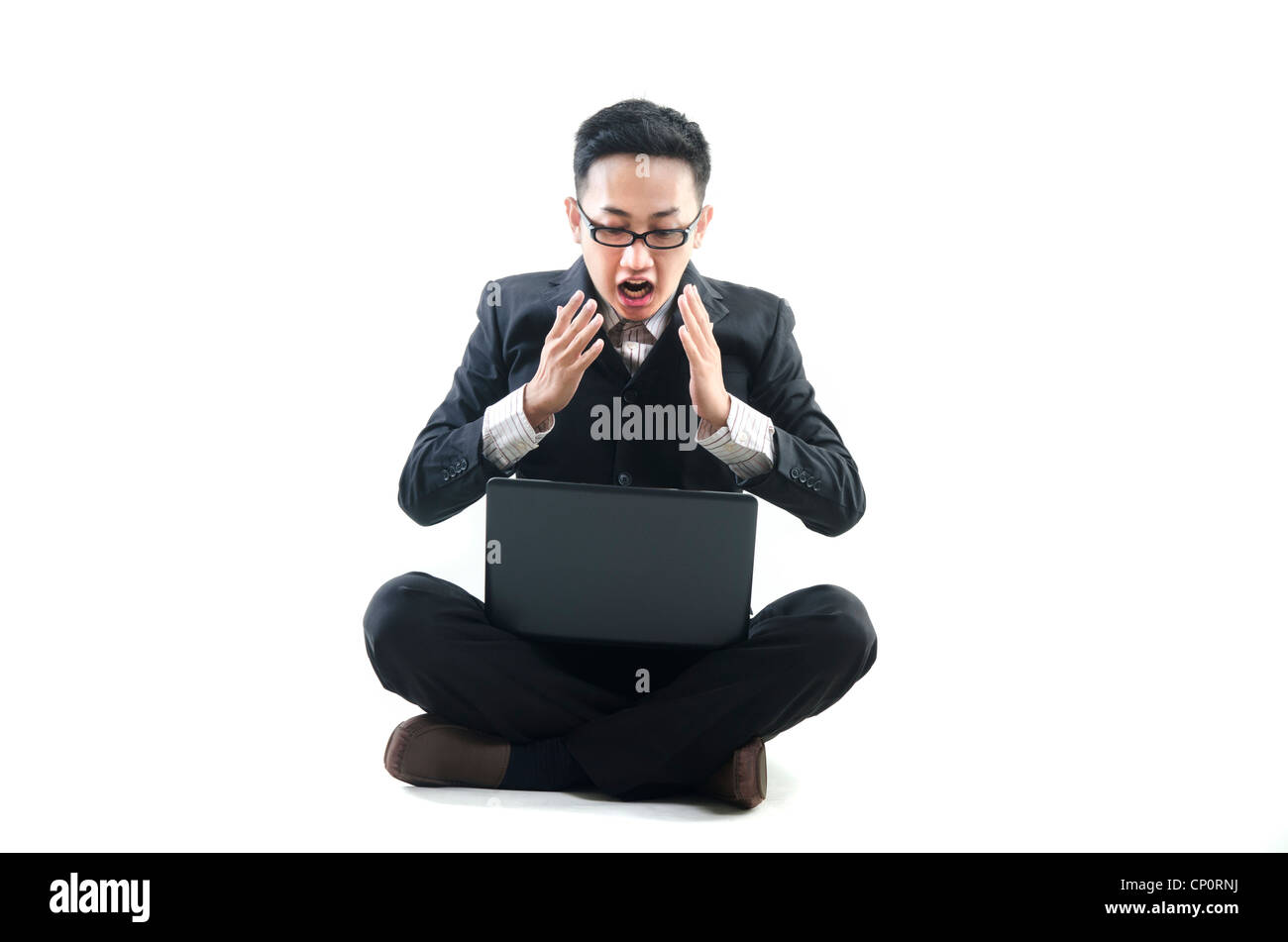 Sitting on office floor Cut Out Stock Images & Pictures - Alamy