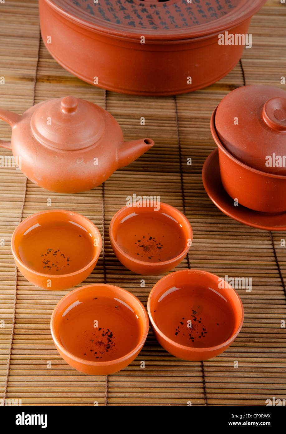 Chinese ceramic tea set and cups on white background Stock Photo - Alamy