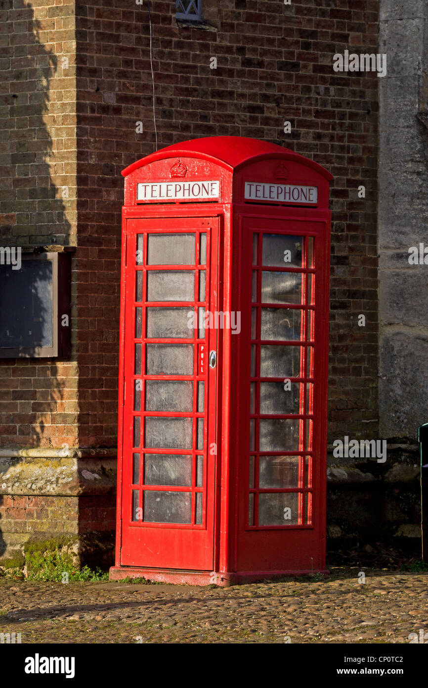 A traditional red phone box in Woburn Bedforshire Stock Photo - Alamy