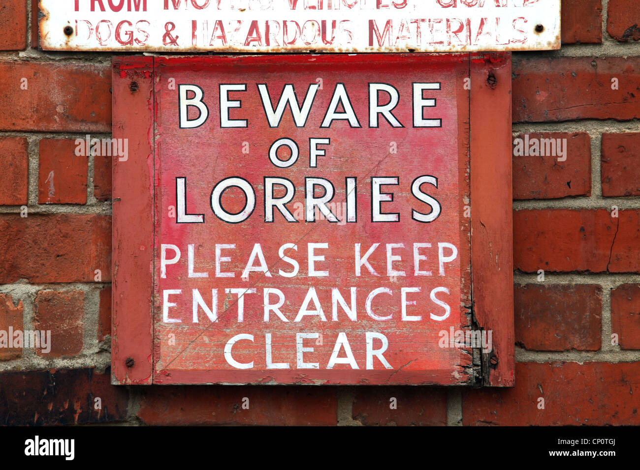 A Beware of Lorries warning sign at business premises in the U.K Stock ...
