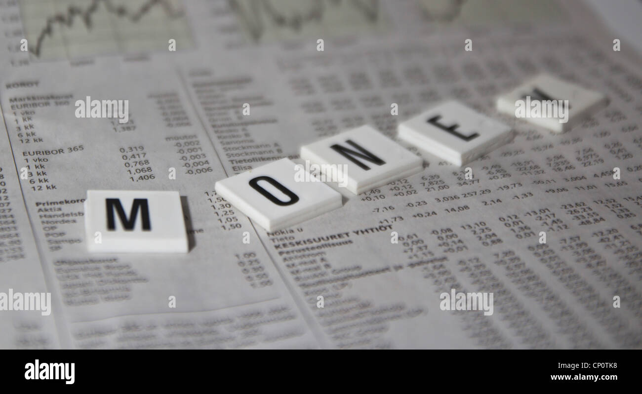 money written over newspaper Stock Photo - Alamy