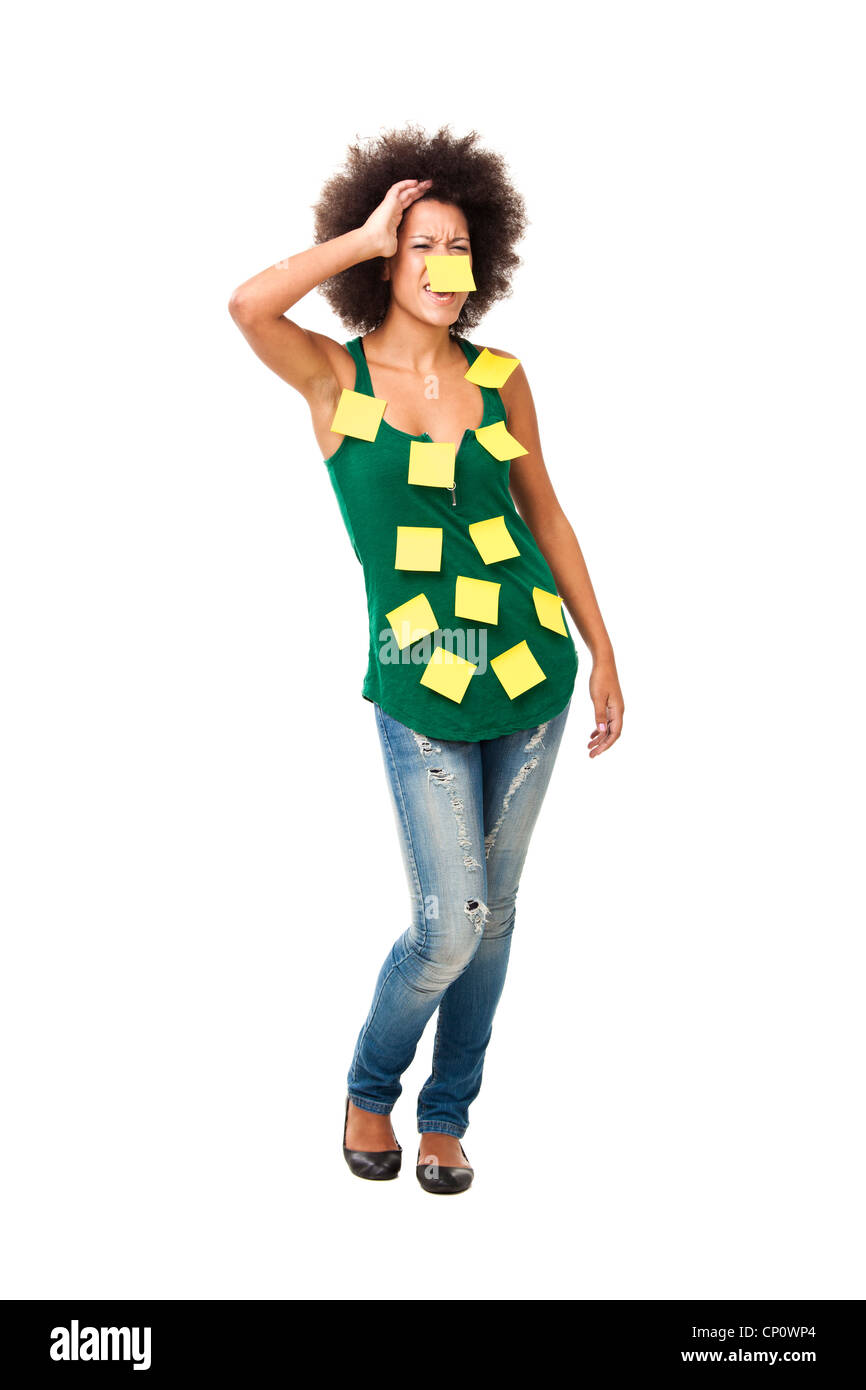 Beautiful young woman covered with post it notes all over the body ...