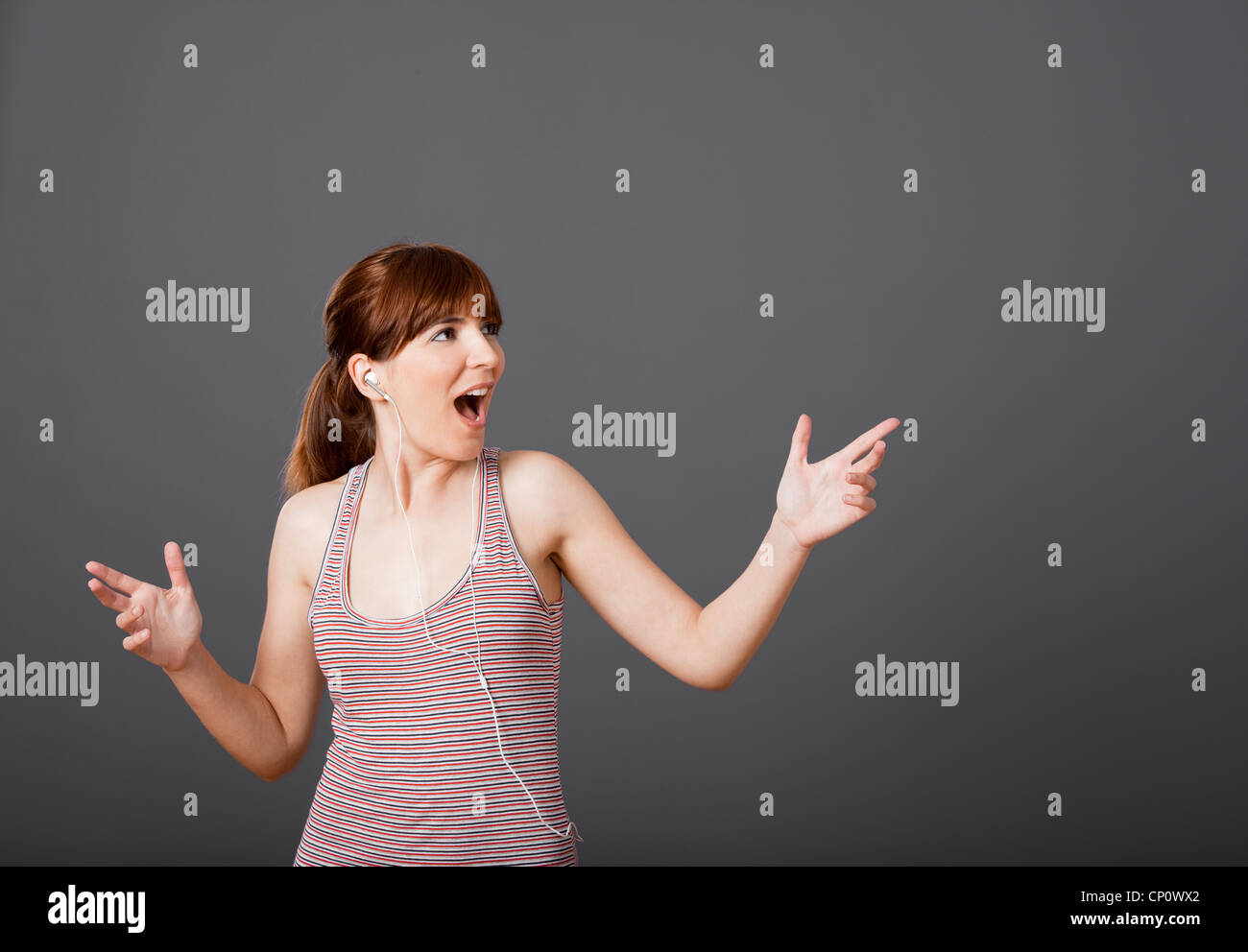 Young women dancing to music hi-res stock photography and images - Alamy