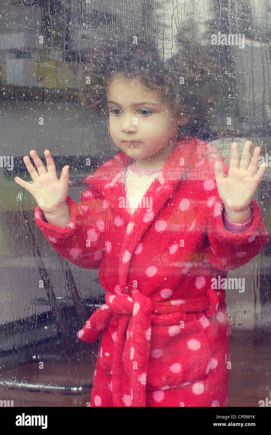 Child wet rain sad hi-res stock photography and images - Alamy