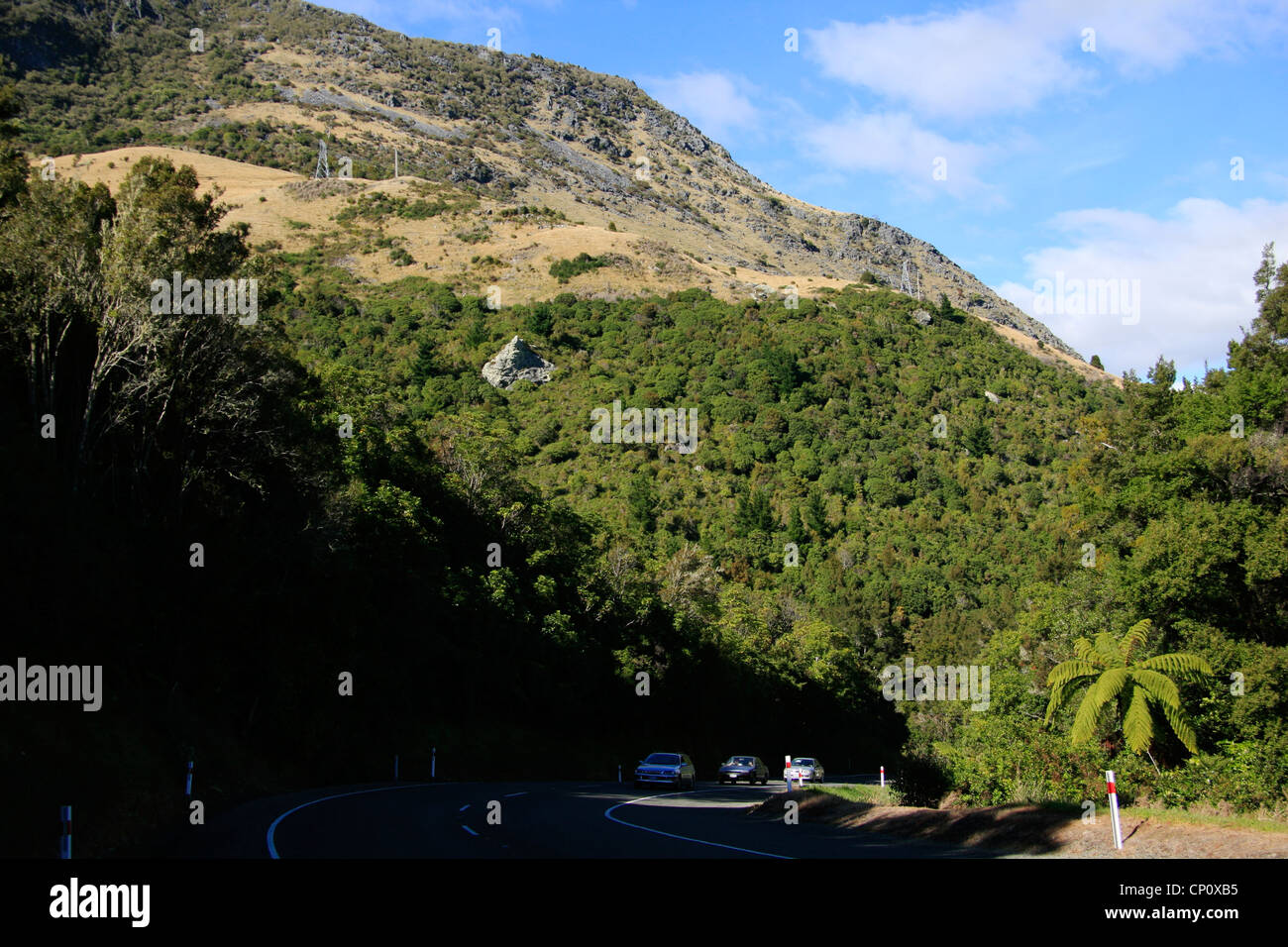 A conical rock viewed from the road of route number 60 through Takaka ...