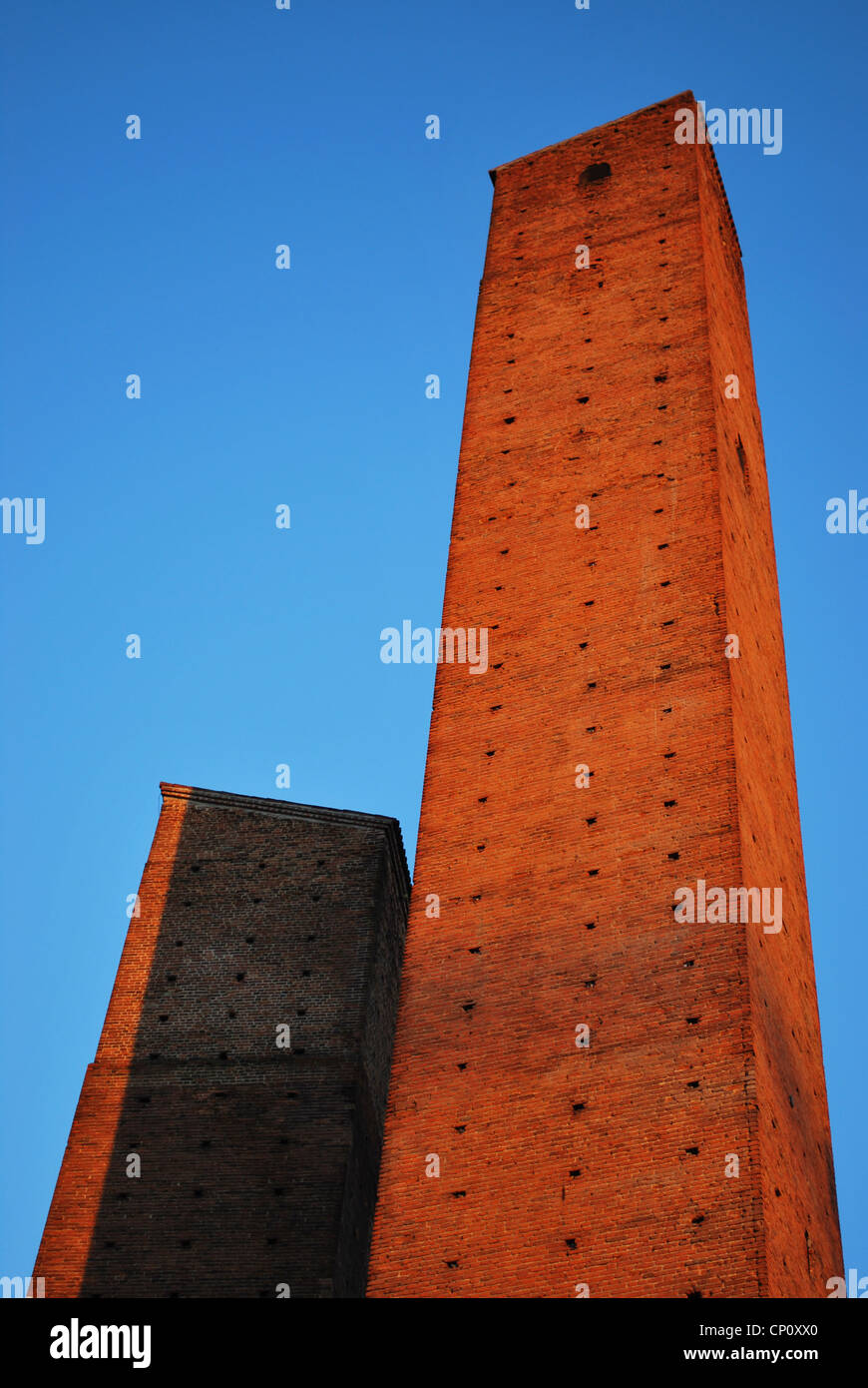Medieval towers on blue sky at sunset, Leonardo Da Vinci square, Pavia ...