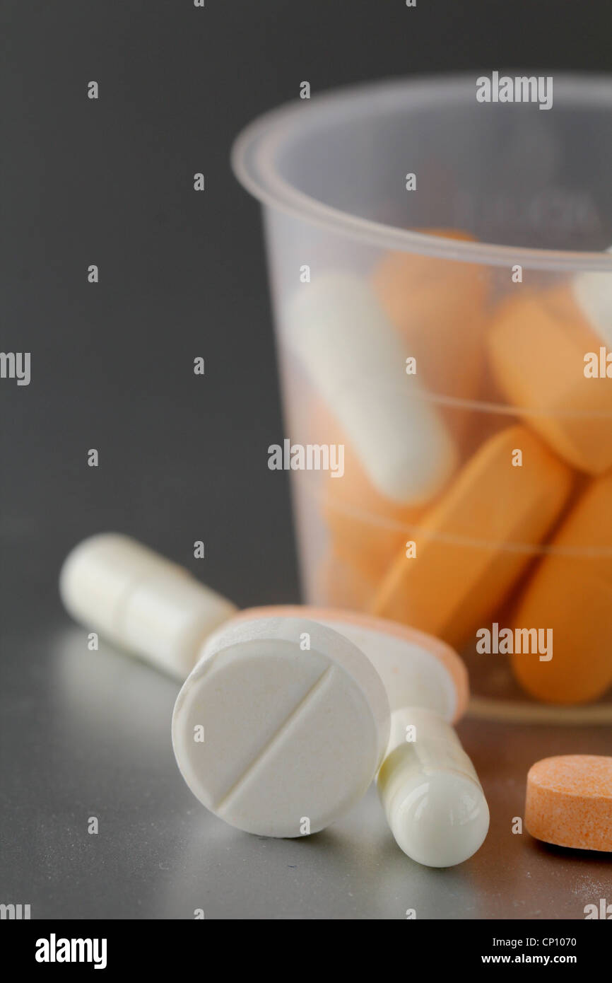 Plastic pill cup hi-res stock photography and images - Alamy