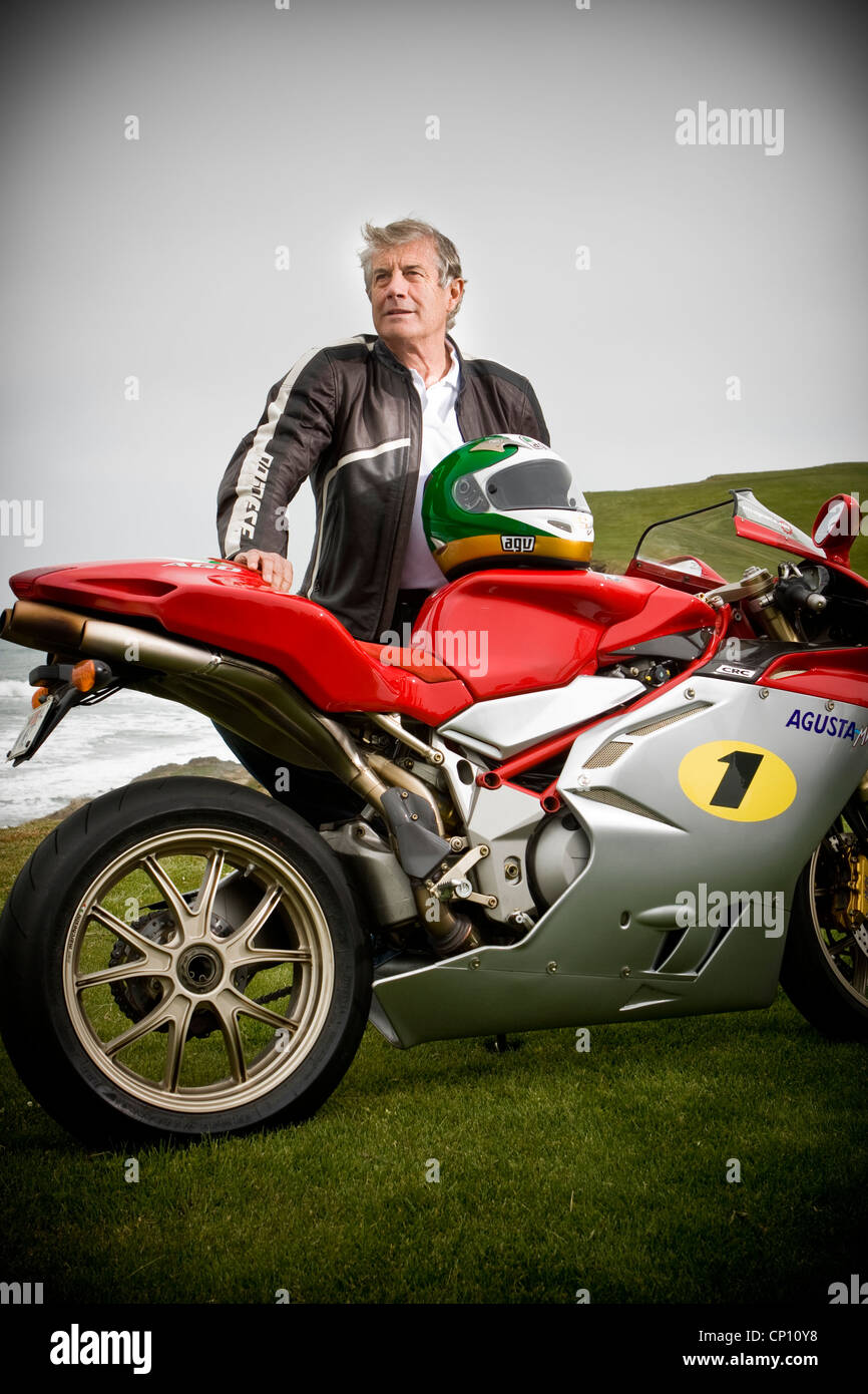 Legendary motorcycle racer Giacomo Agostini pose with the limited ...