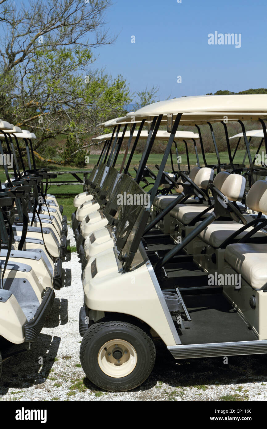 Golf carts lined up and ready for use. North Truro, Cape Cod ...