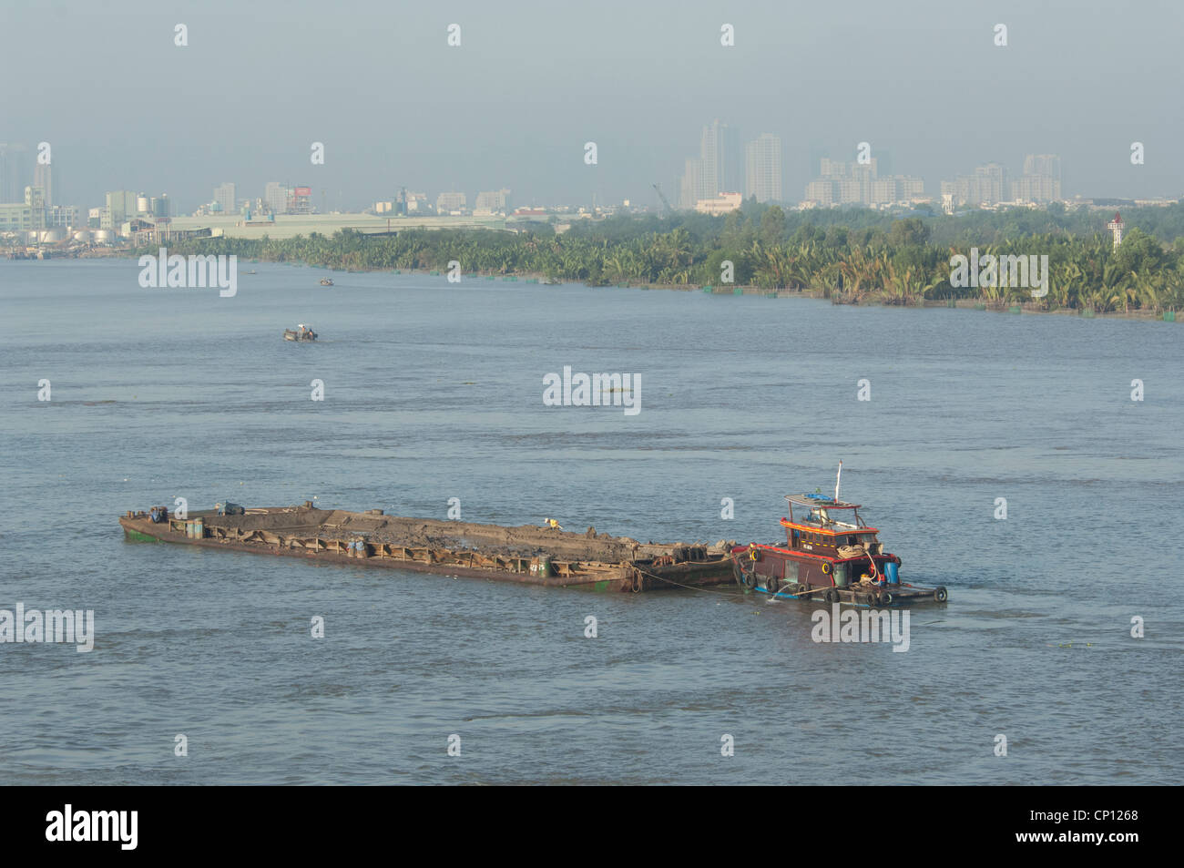 Vietnam, Ho Chi Minh City (aka Saigon). Typical Saigon River view with ...