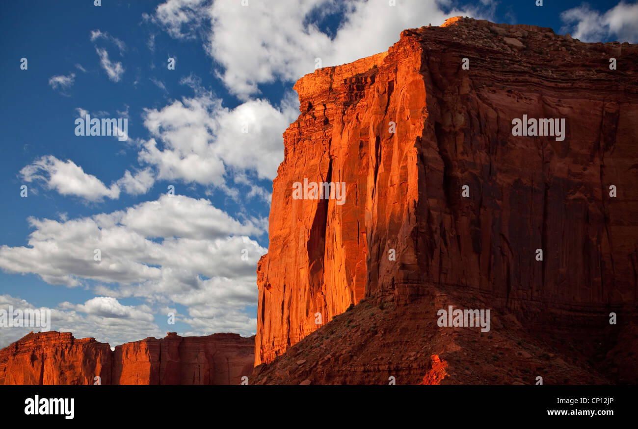 A Red Rock Cliff Under A Blue Sky In Monument Valley Arizona, Utah ...