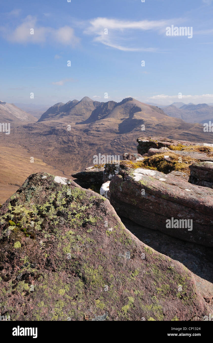 Lichen covered sandstone rocks on the summit of Tom na Gruagaich, Beinn ...