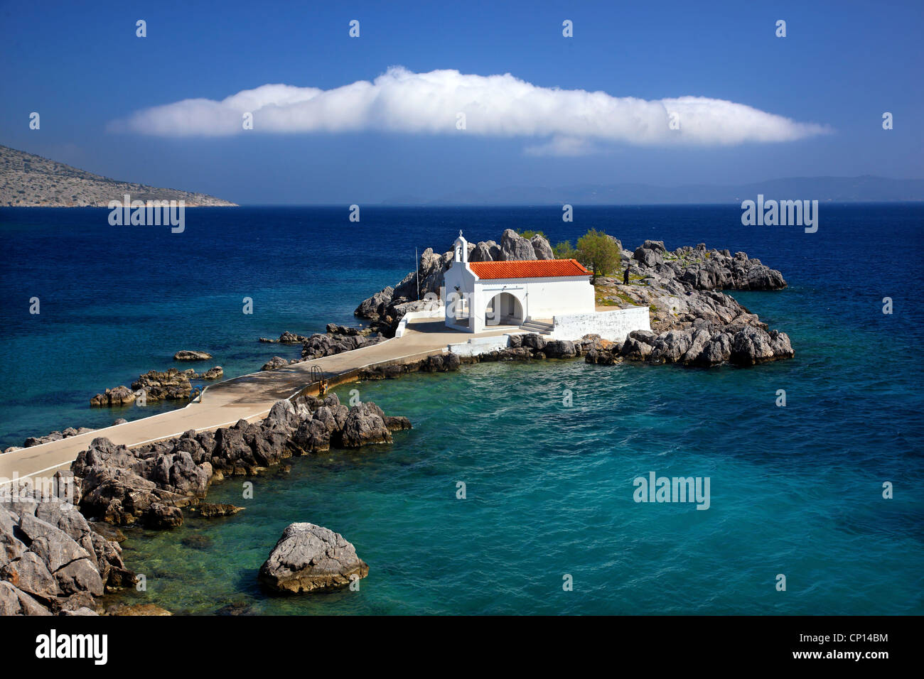 The little church of Agios Isidoros upon a tiny islet, close to Langada ...
