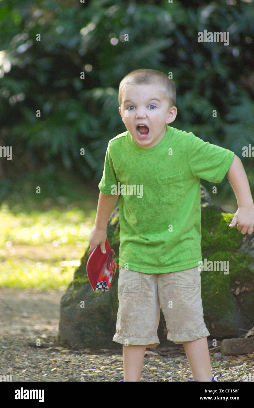 4 year old autistic boy screams at camera after getting wet by the ...
