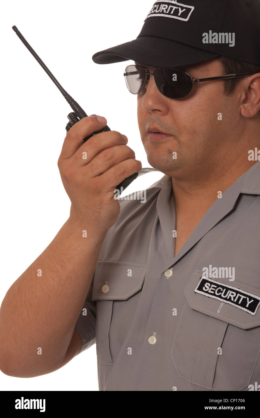 Security guard hand holding cb walkie-talkie radio Stock Photo - Alamy