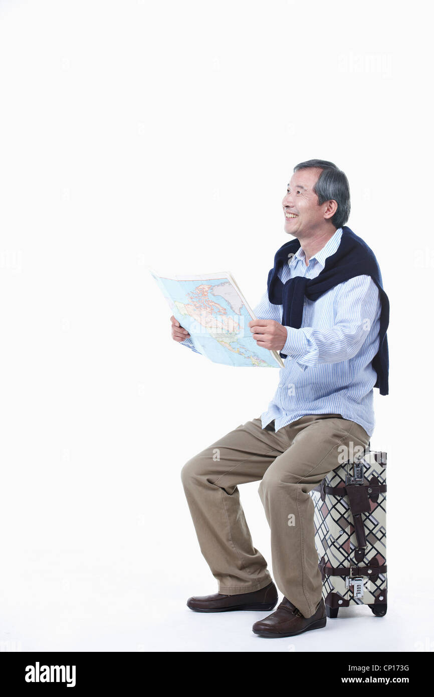 An old man going on travel Stock Photo - Alamy