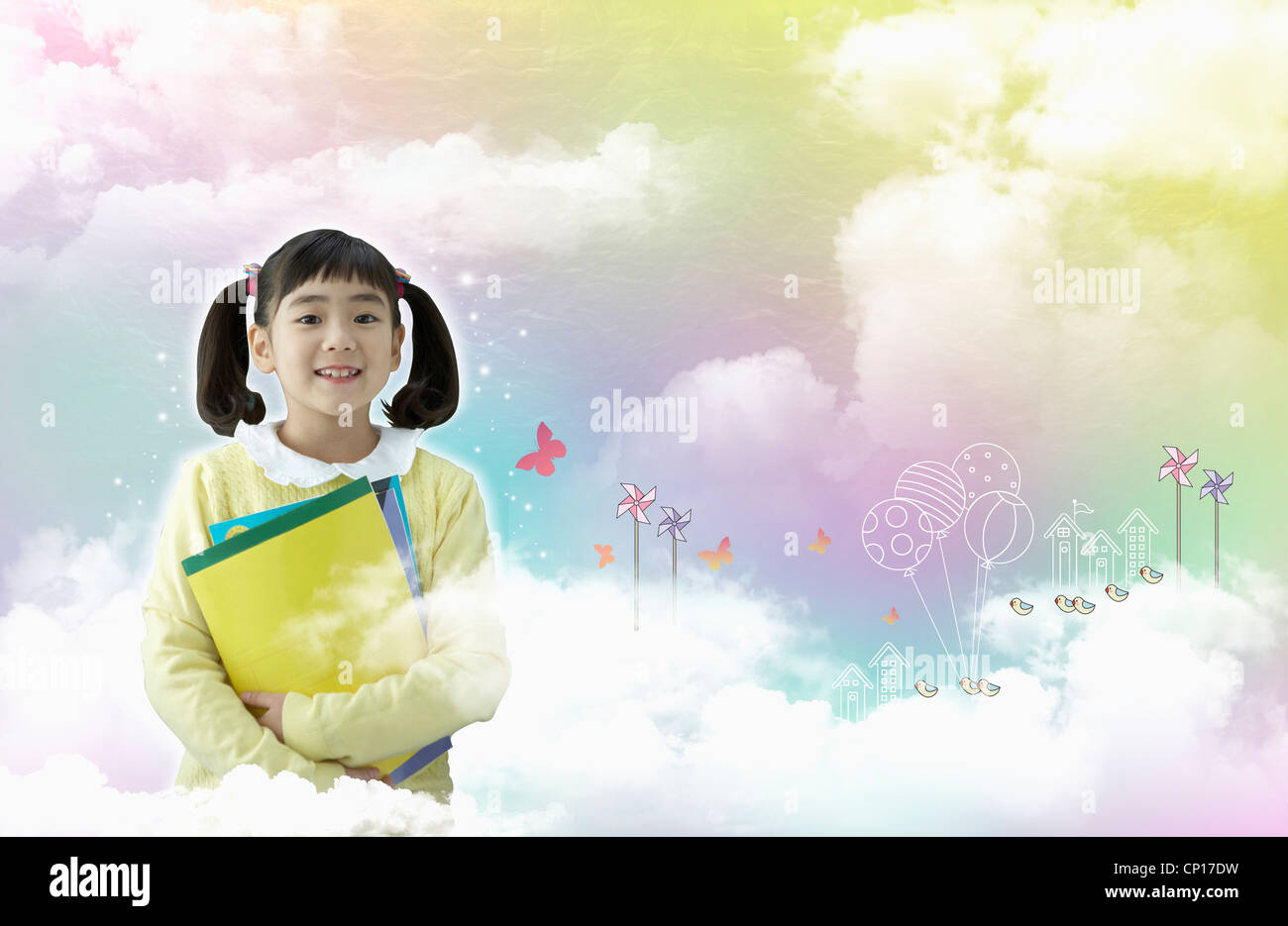 A girl holding the note Stock Photo - Alamy