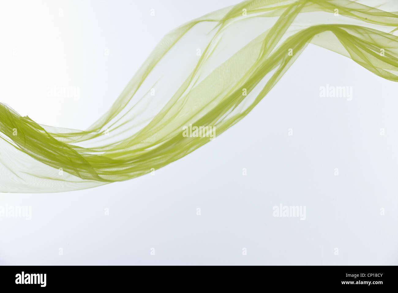 Waving green cloth Stock Photo - Alamy