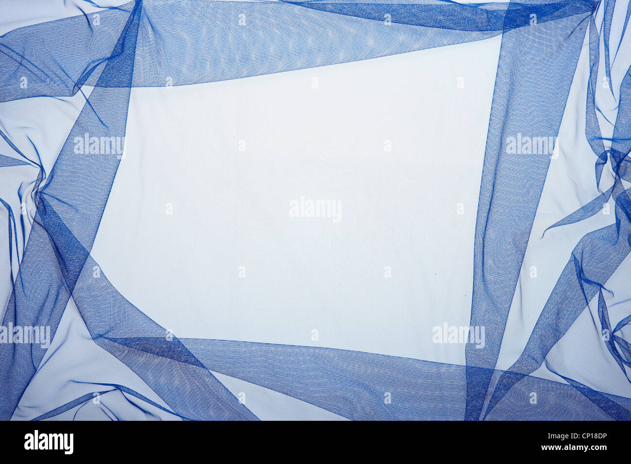 Wrinkled blue cloth in square Stock Photo - Alamy