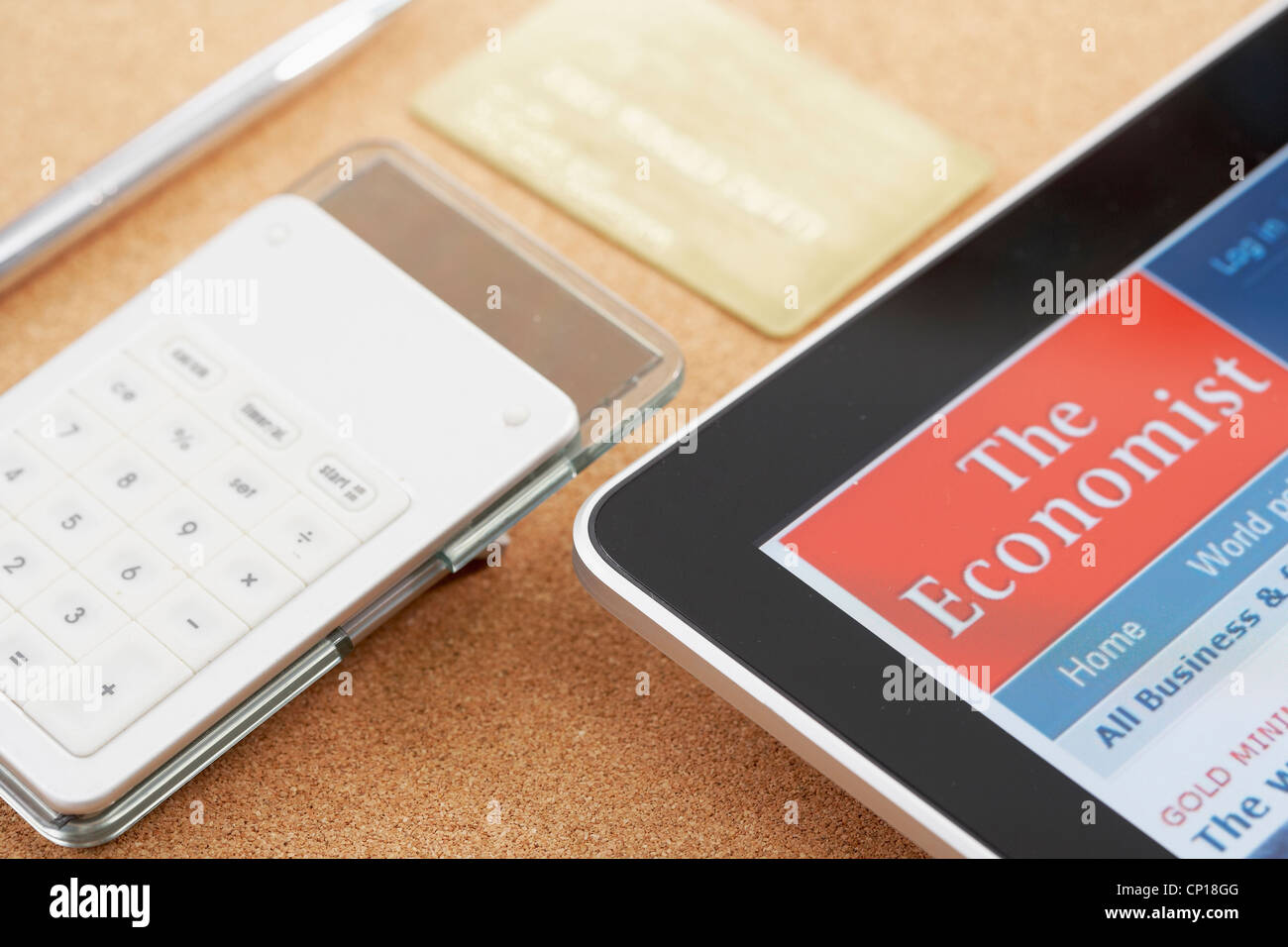 A tablet PC showing the article on the office desk Stock Photo - Alamy
