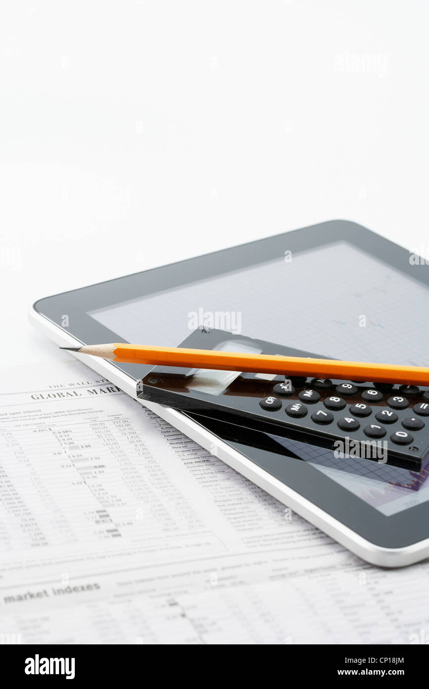 A tablet PC on the office desk with other items Stock Photo - Alamy