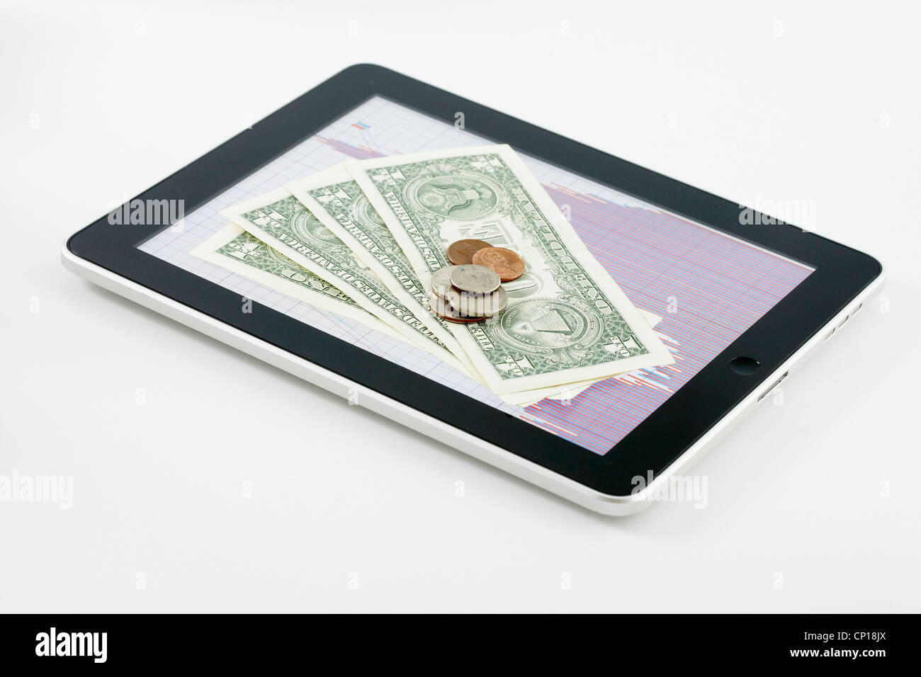 A tablet PC showing chart and the money Stock Photo - Alamy