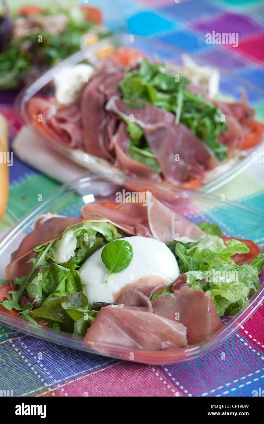Delicious variety of italian salad with ham and mozzarella cheese Stock ...