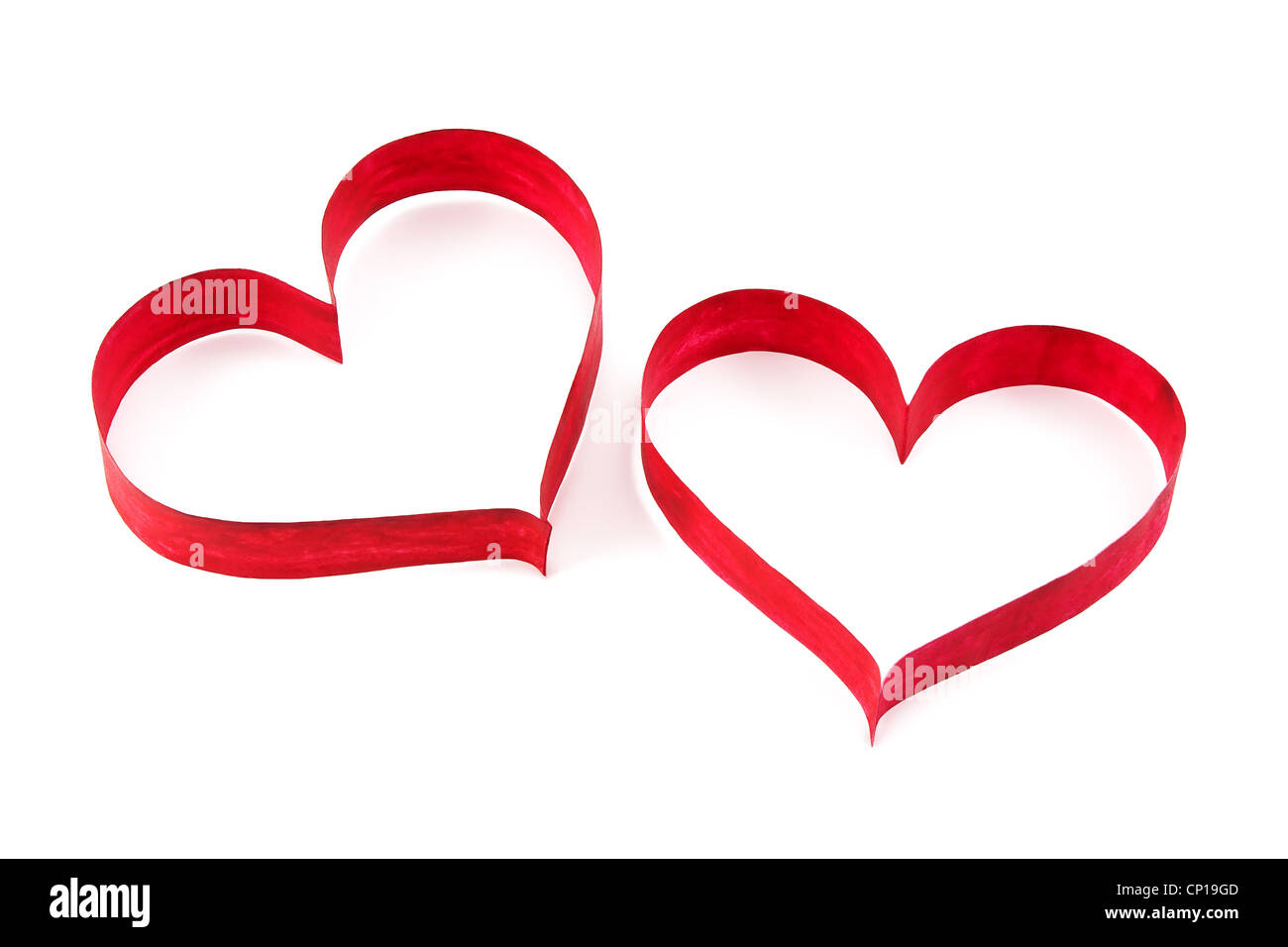 Paper hearts on red Cut Out Stock Images & Pictures - Alamy