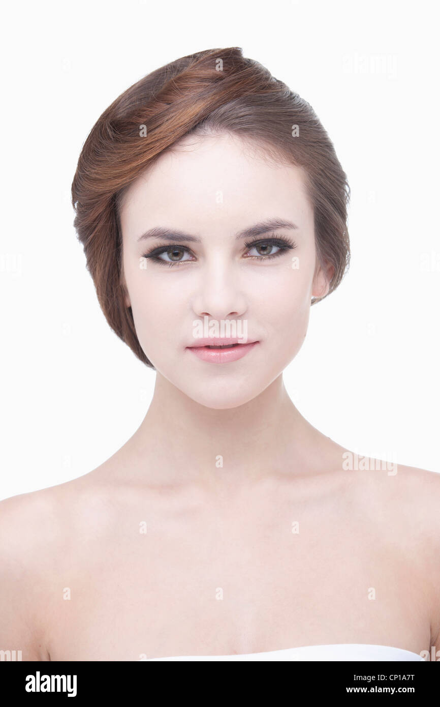 A woman with up hair styling Stock Photo - Alamy