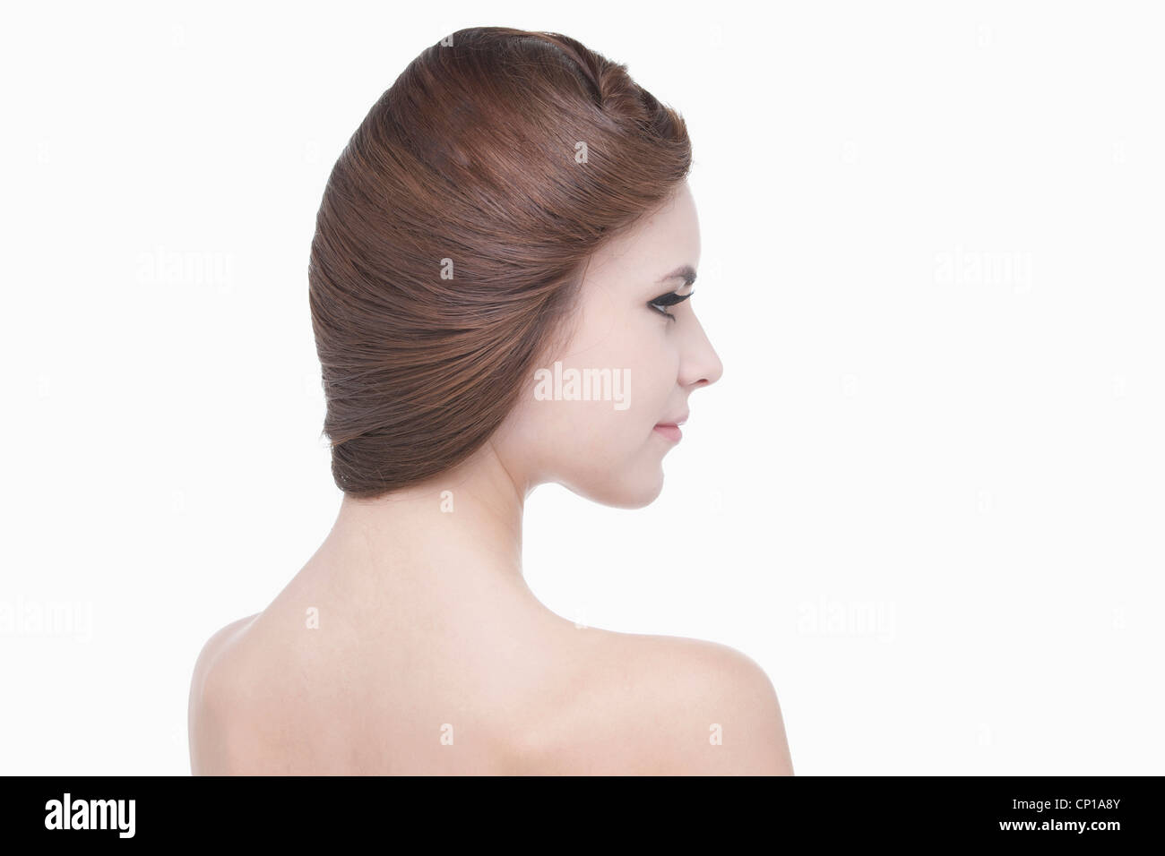 A woman with up hair styling Stock Photo - Alamy