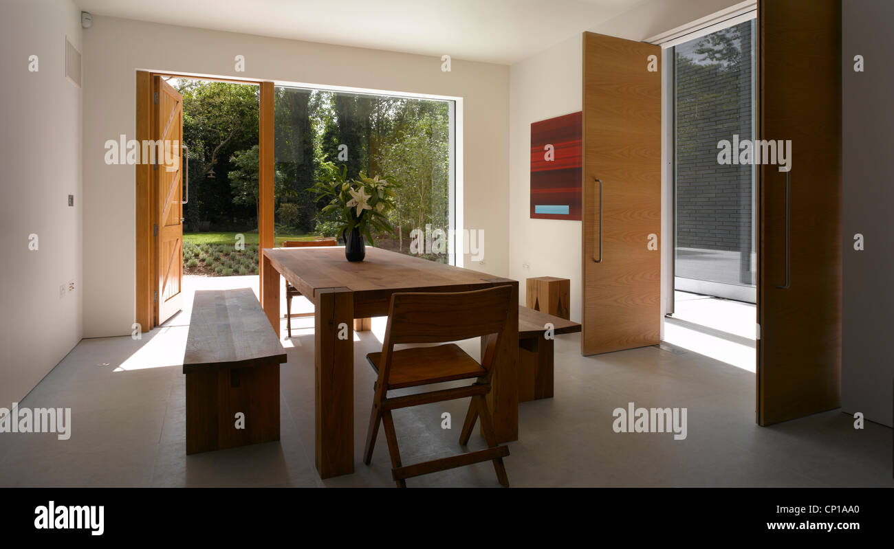 Modern Dual-aspect dining room Stock Photo - Alamy