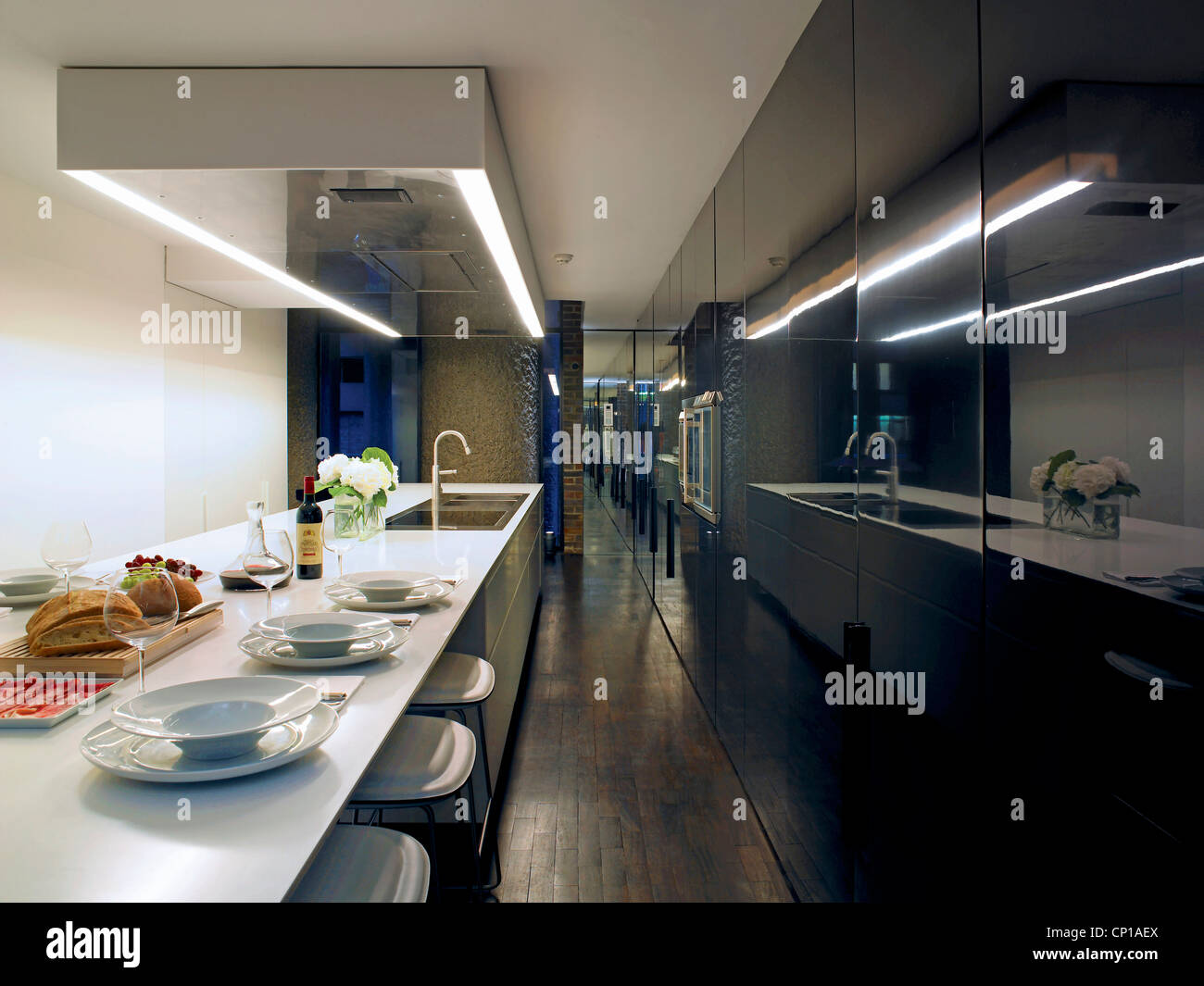 Dining table in modernist apartment in the Barbican, London, UK Stock ...