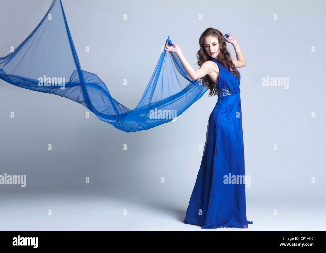 Beauty in blue dress hi-res stock photography and images - Alamy