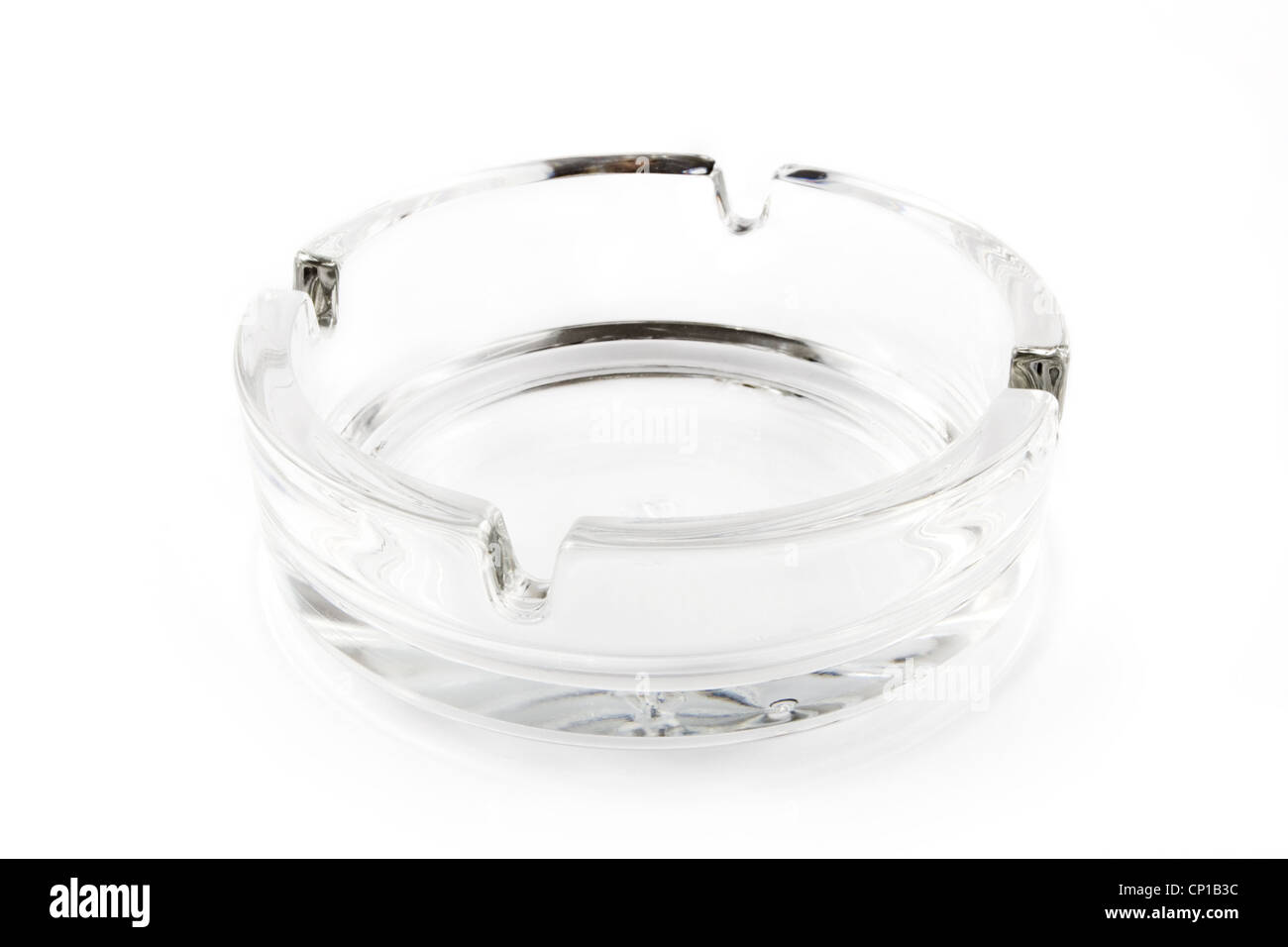 Empty glass ash tray on a white background Stock Photo - Alamy