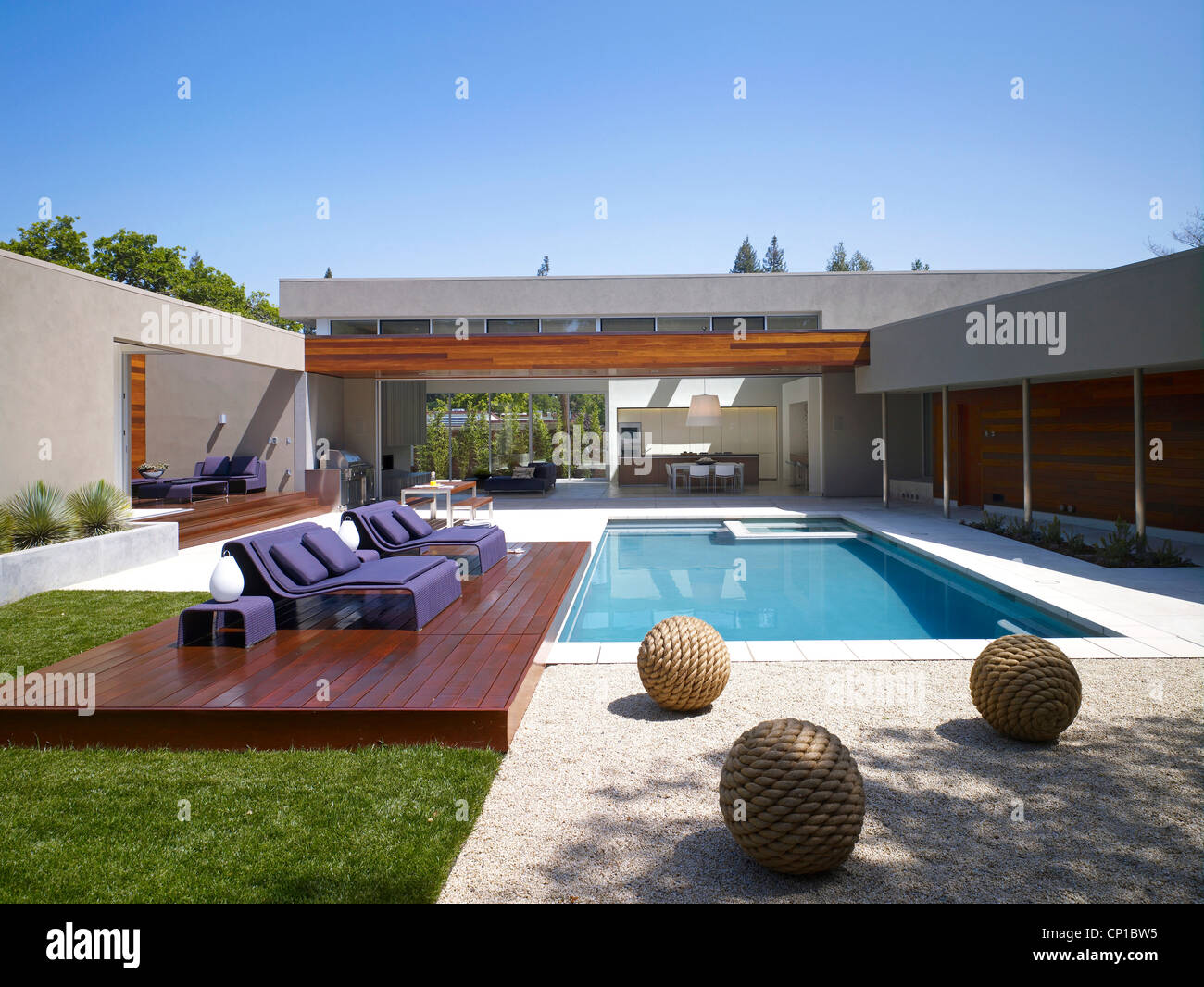 Pool terrace with furniture Stock Photo - Alamy