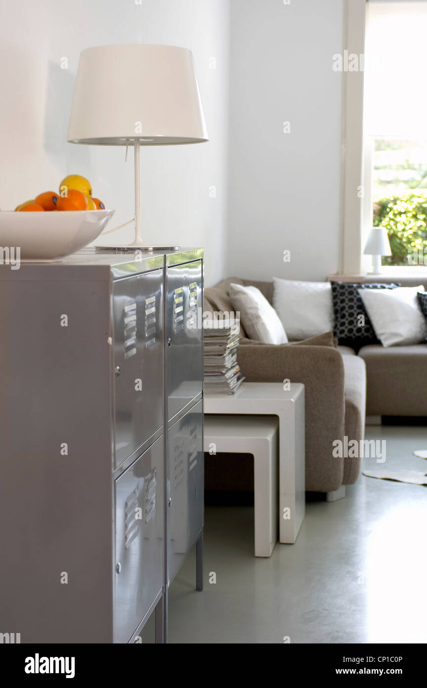 Side cabinet in living room of family home Stock Photo - Alamy
