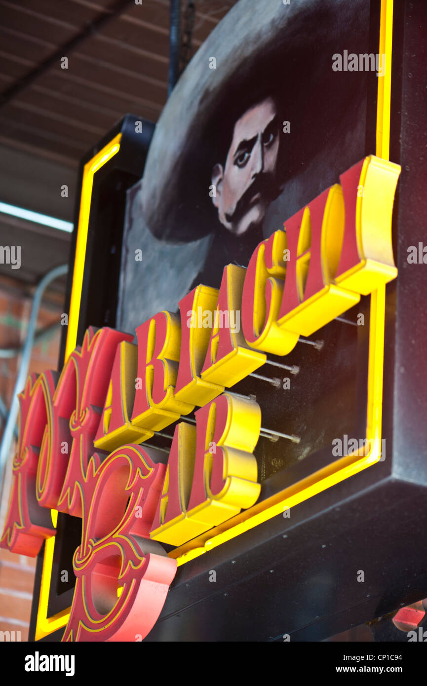 Detail of Mariachi Bar sign with iconic Mexican man in sombrero with ...