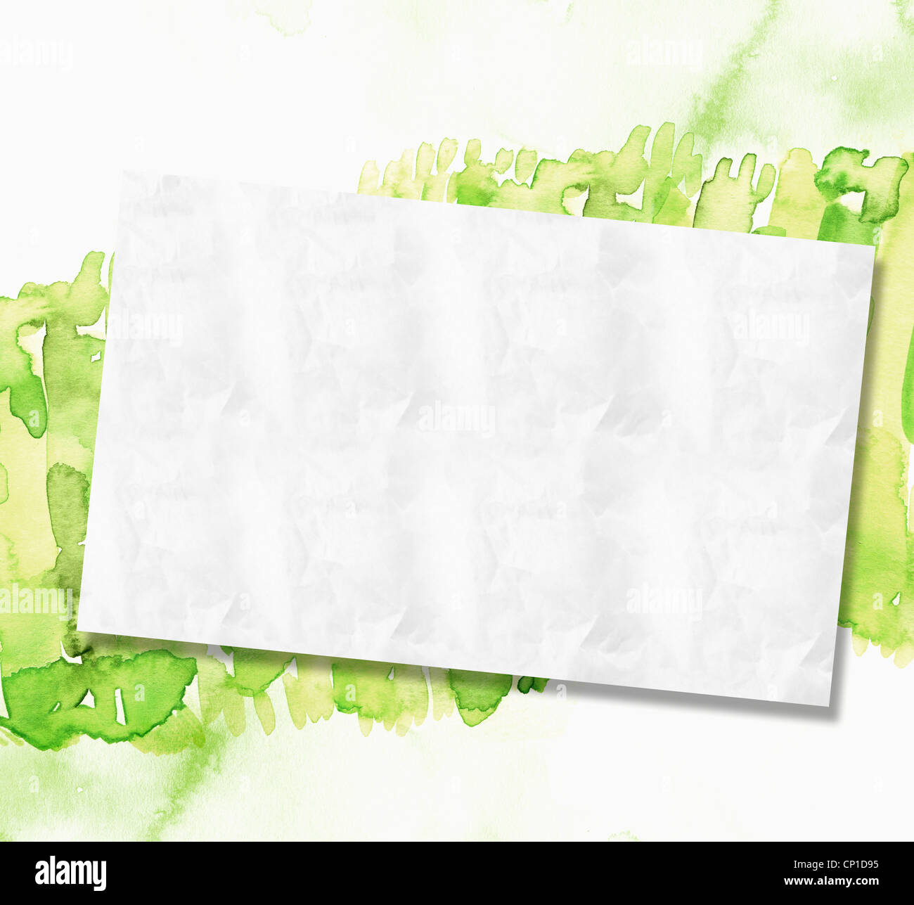 White paper and green paint Stock Photo - Alamy