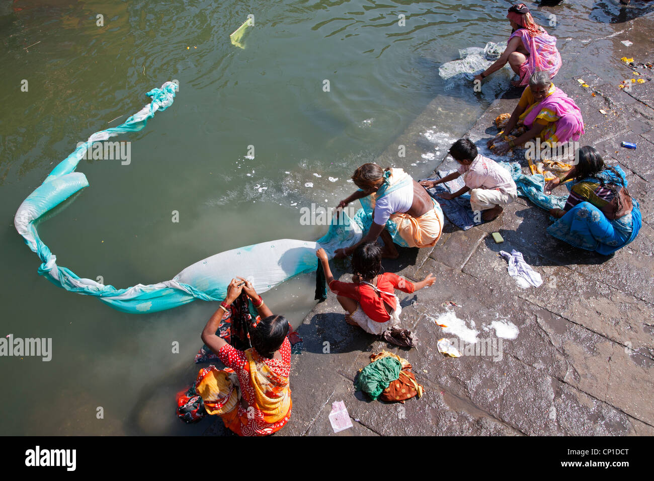 Indian women washing clothes hi-res stock photography and images - Alamy